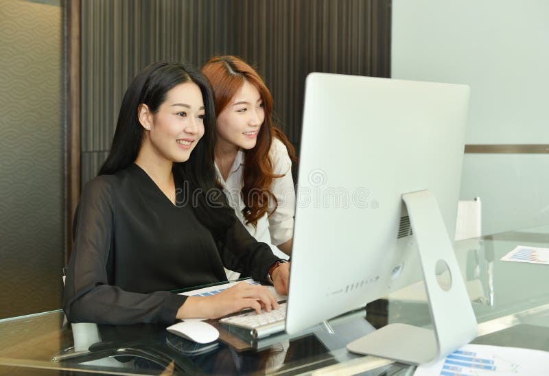 Asian Business Women Using Computer in Office Stock Photo - Image of ...