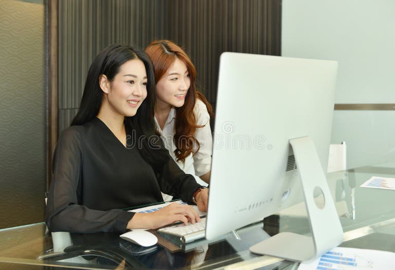 Asian Business Women Using Computer in Office Stock Photo - Image of ...