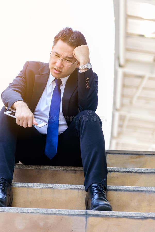 Asian Businessman Feel Sad And Frustrated Upset Fail In Life Stock