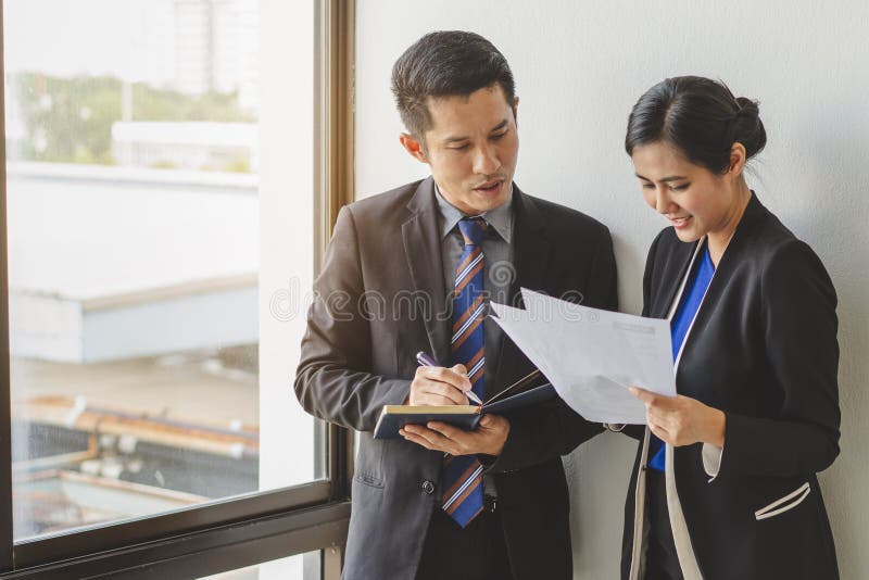Asian Businessman Giving Advice To Internship Student Stock Image ...