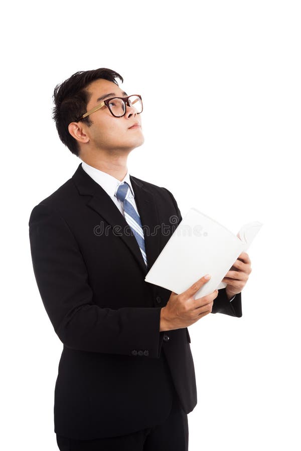 Asian Businessman Read a Book Imagine of Something Stock Image - Image ...