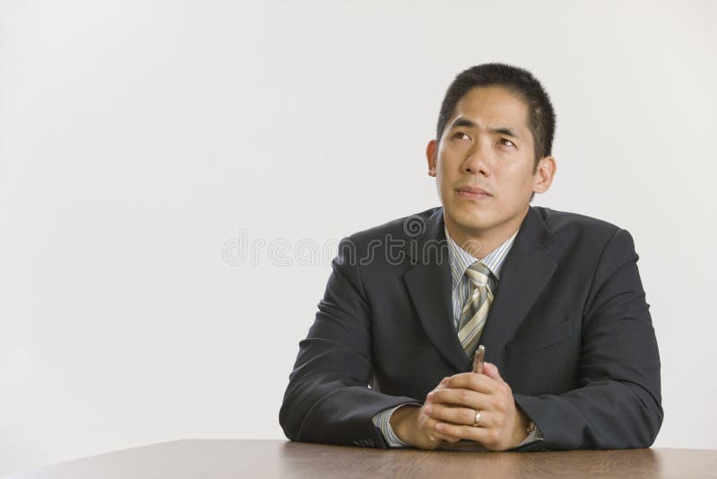 Asian businessman thinking stock photo. Image of confidence - 10946962
