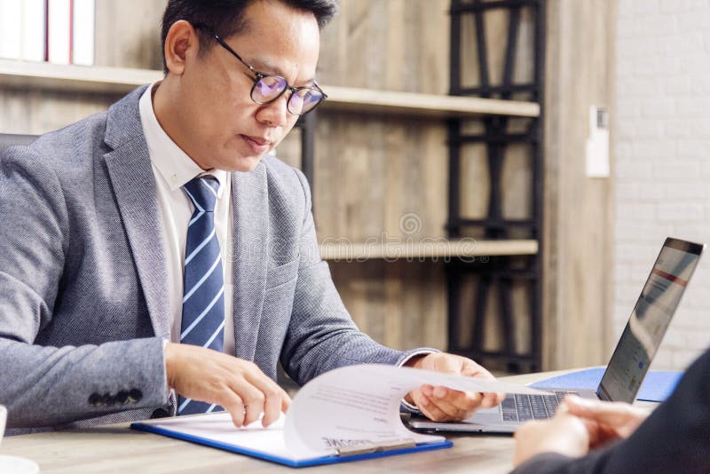 Asian Businessman Using Laptop at Office Desk. Man Hands Typing ...