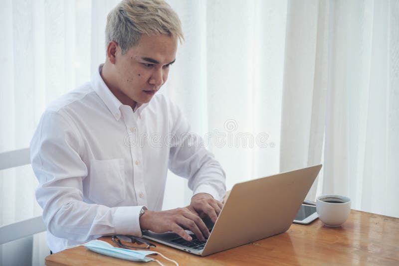 Asian Businessman Using Laptop at Office Desk. Man Hands Typing ...
