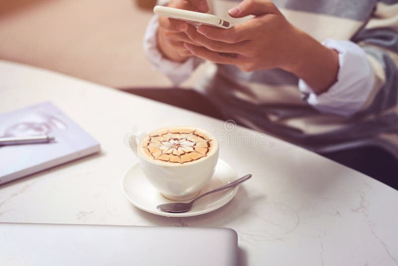 Asian Businessman Using Mobile Phone during Coffee Break on Tab Stock ...