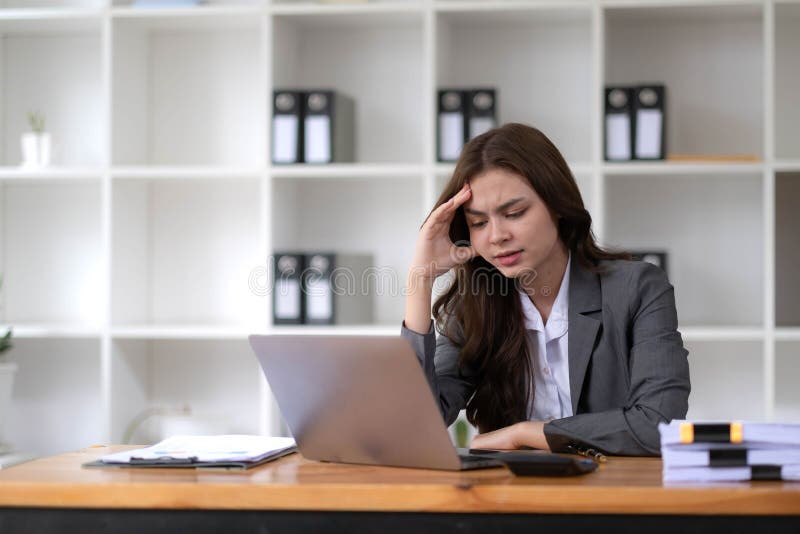 Asian Businesswoman are Serious at Work Causing Headache Stressed Out ...