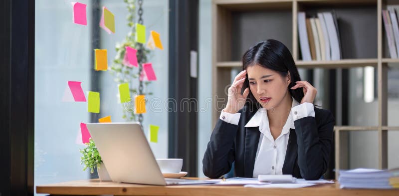 Asian Businesswoman are Serious at Work Causing Headache Stressed Out ...