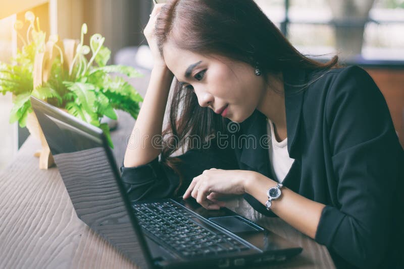 Asian Businesswoman Serious about the Work Done until the Headache,soft ...