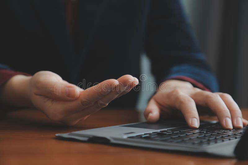Asian Businesswoman Using Laptop Computer and Working at Office with ...