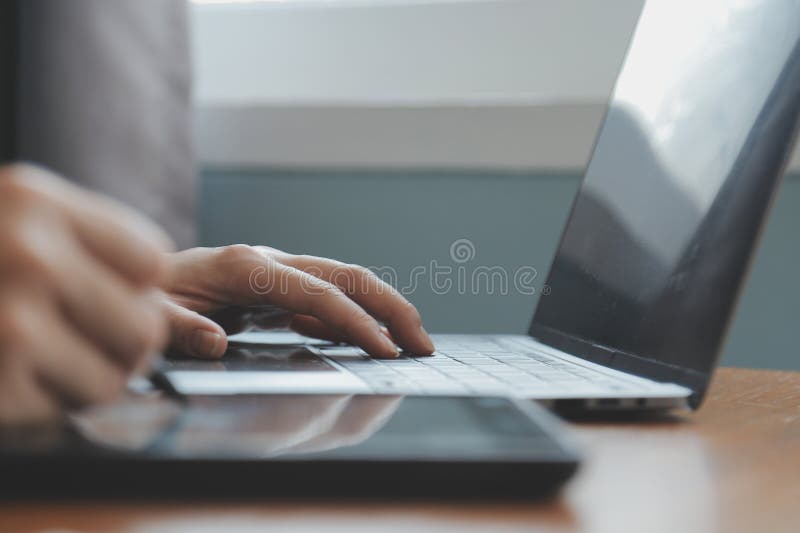 Asian Businesswoman Using Laptop Computer and Working at Office with ...