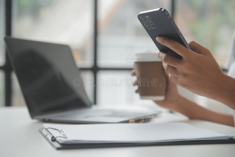 Asian Businesswoman Using Laptop Computer and Working at Office with ...