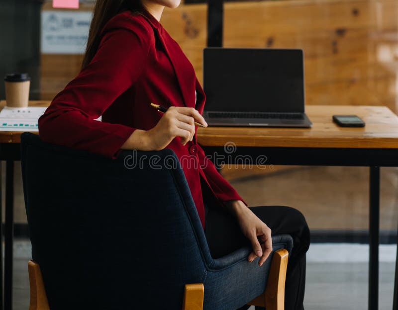 Asian Businesswoman Using Laptop Computer and Working at Office with ...