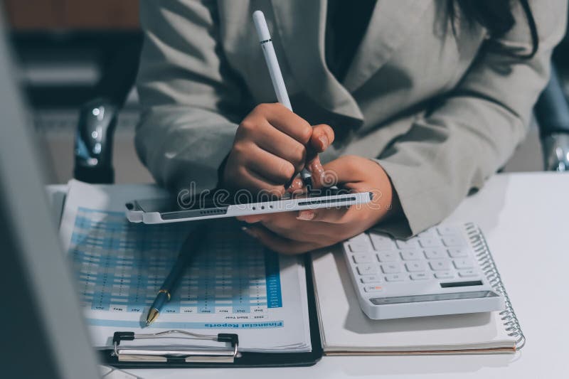 Asian Businesswoman Using Laptop Computer and Working at Office with ...