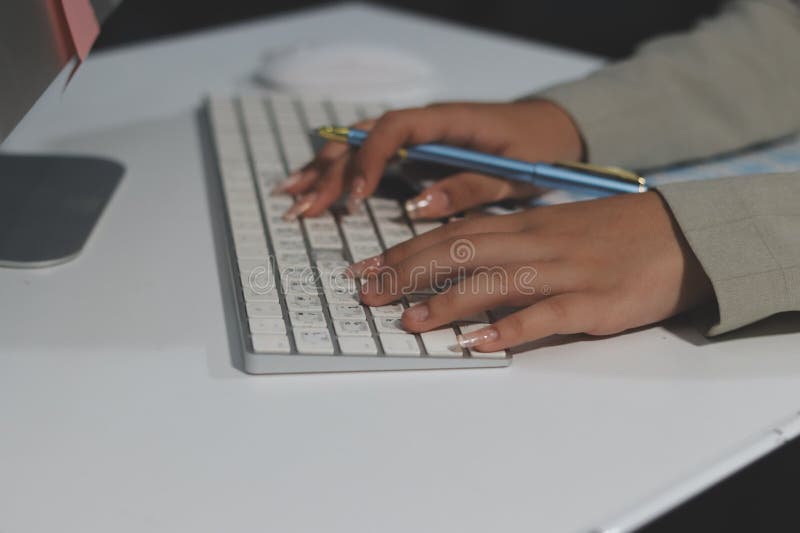Asian Businesswoman Using Laptop Computer and Working at Office with ...