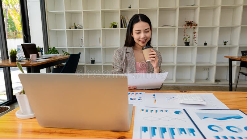 Asian Businesswoman Working, Pointer Graph, Discussion and Data ...