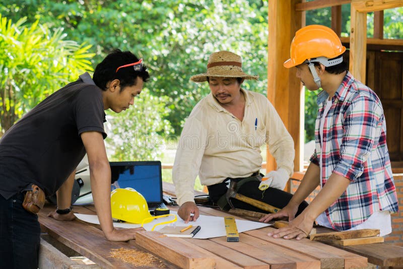 Asian Carpentry Engineer is Planning a Job To Build a Building Stock ...