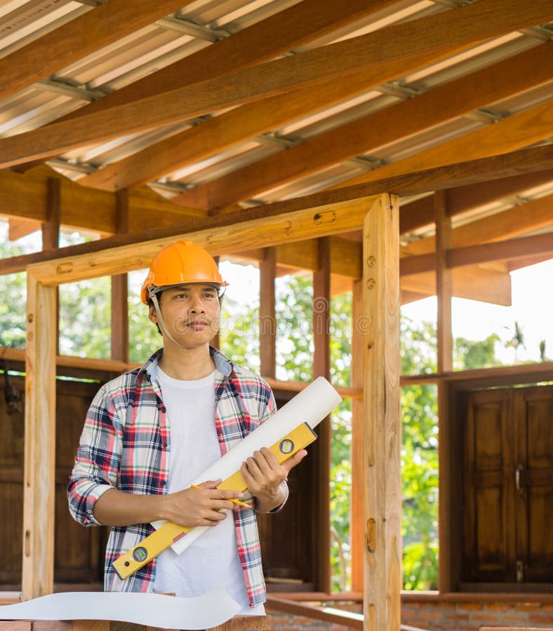 Asian Carpentry Engineer is Planning a Job To Build a Building Stock ...
