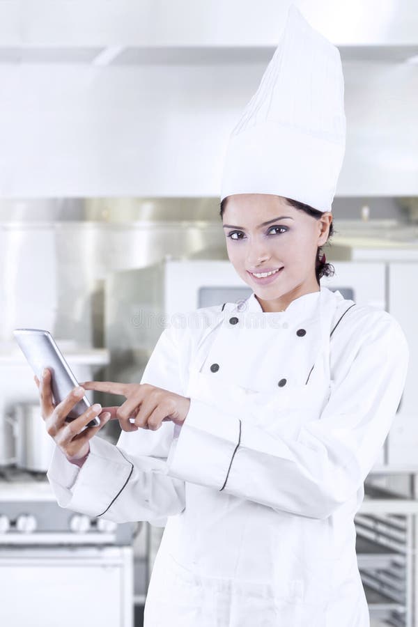 Asian Chef Using Cellphone in Kitchen Stock Photo - Image of kitchen ...