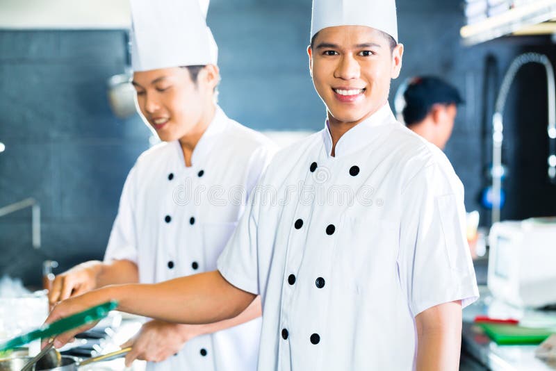 Asian Chefs Cooking in Restaurant Stock Photo - Image of teamwork ...