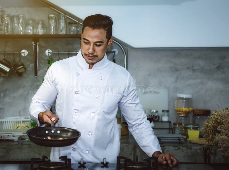 Asian Chefs, Cooking To Be Delicious and Skilled. Stock Photo - Image ...