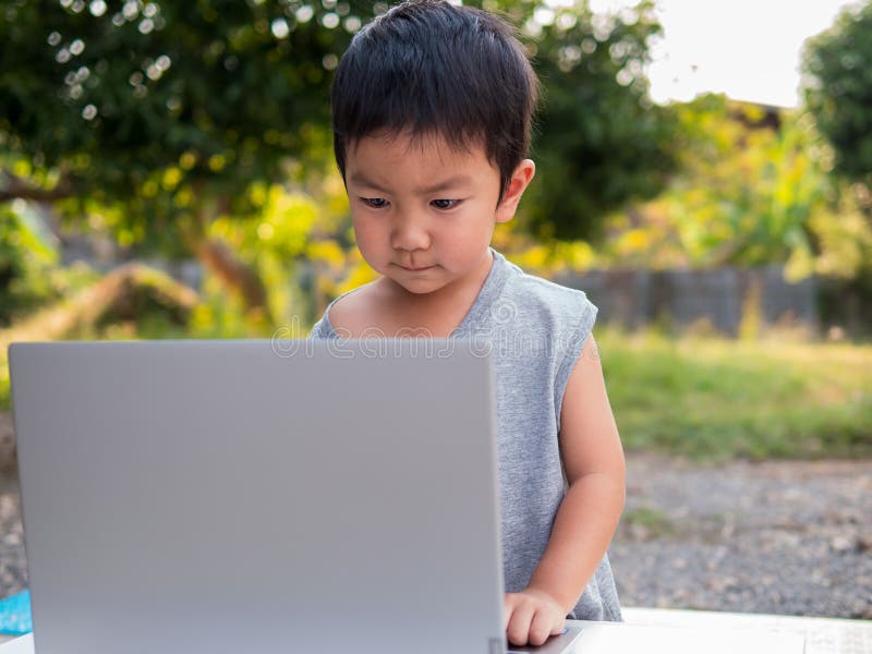 Asian Child Boy Using Notebook or Laptop in Rural Nature Background ...