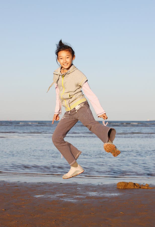 Asian child jump stock image. Image of detail, child - 12467825