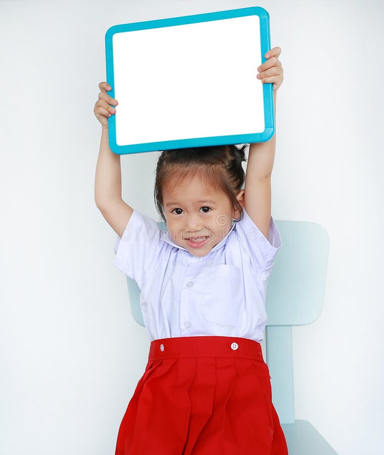 Asian Child in School Uniform Holding Empty Whiteboard Isolated on ...