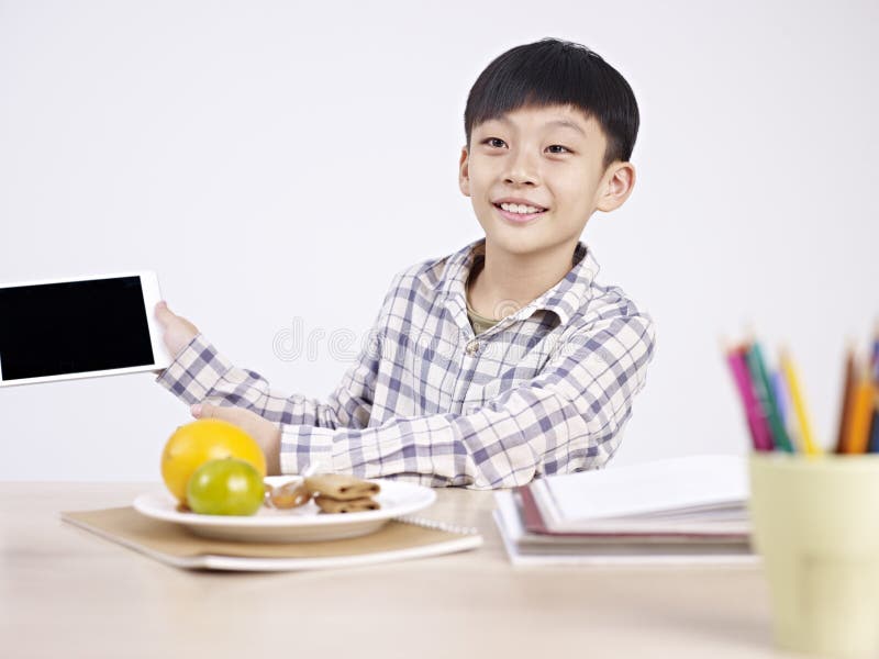 Asian Child Using Tablet Computer Stock Photo - Image of east, games ...