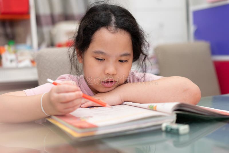 Asian Child Sit and Writing Book on Table in Room House Stock Image ...
