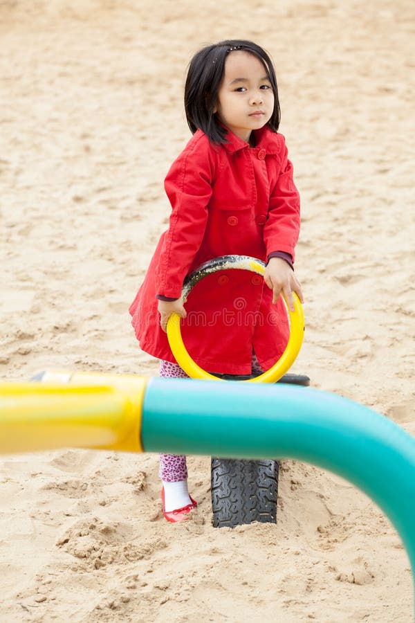 Asian Child Spending Time on the Playground Stock Image - Image of face ...