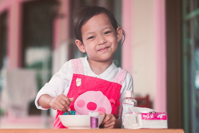 Asian Children Cooking and Smiling with Happiness at Home Stock Image ...