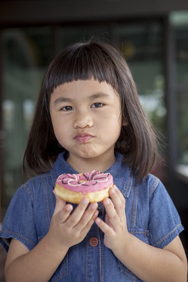 Asian Children Happiness Face with Sweet Candy in Hand Stock Photo ...