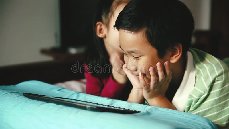 Asian Children Using Digital Tablet. Cinematic Tone. Stock Footage ...
