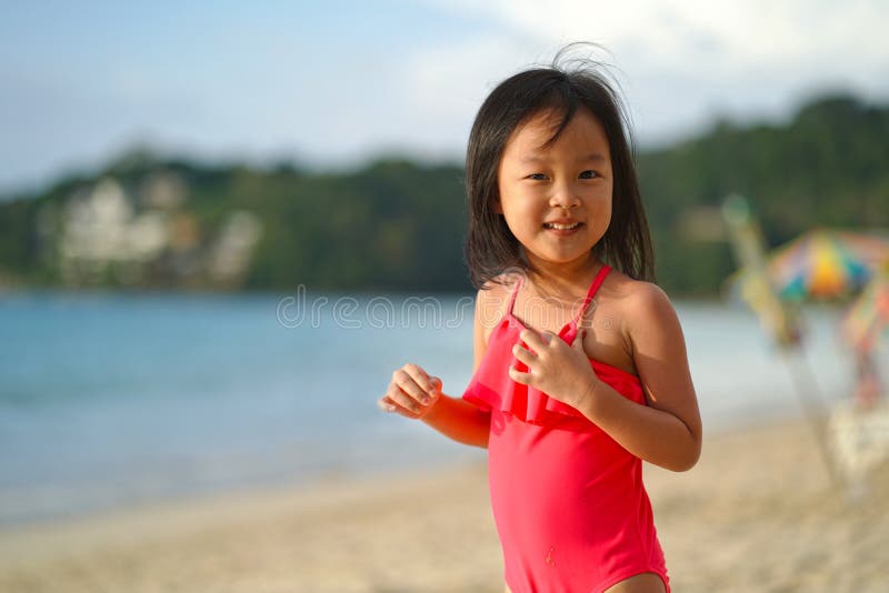 Asian Chinese Daughter Child Playing by the Beach Stock Photo - Image ...