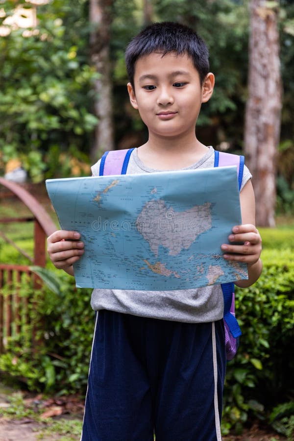 Asian Chinese Little Boy Holding Map in the Forest Stock Image - Image ...