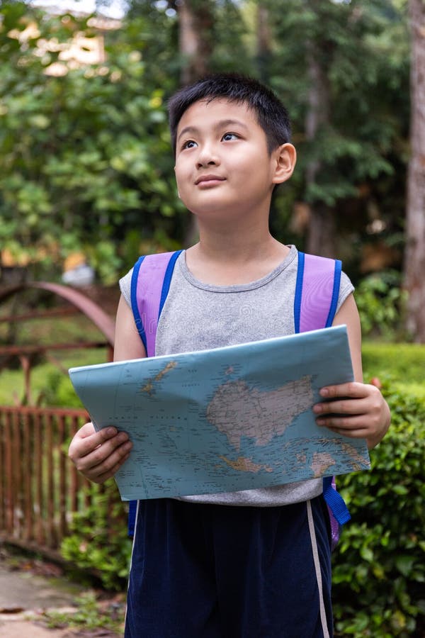 Asian Chinese Little Boy Holding Map in the Forest Stock Photo - Image ...