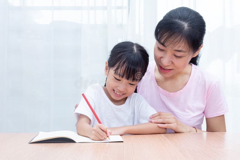 Asian Chinese Mother Teaching Daughter Doing Homework Stock Image ...