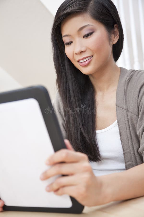 Asian Chinese Woman Using Tablet Computer Stock Image - Image of toothy ...