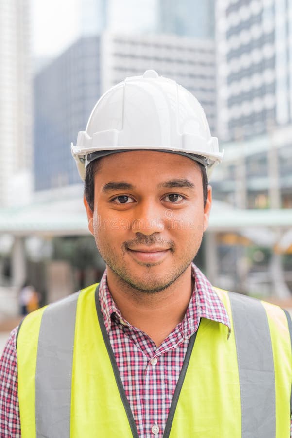 Asian Civil Engineer Working at Building Site. Stock Image - Image of ...