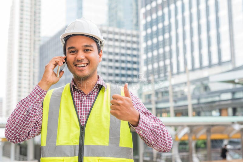 Asian Civil Engineer Working at Building Site. Stock Photo - Image of ...