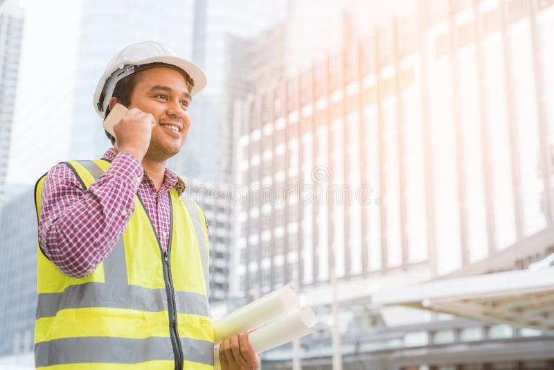 Asian Civil Engineer Working at Building Site. Stock Image - Image of ...