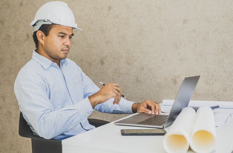Asian Civil Engineer Working Planning Project with Laptop Stock Photo ...
