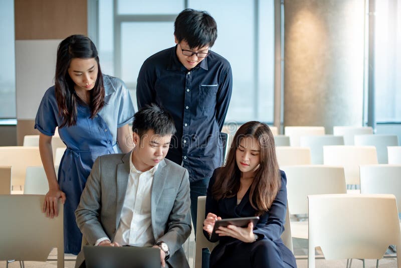 Asian Colleagues Discussing in Conference Room Stock Photo - Image of ...