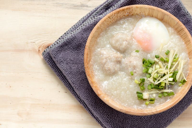 Asian Congee with Minced Pork and Egg in White Bowl. Stock Photo ...