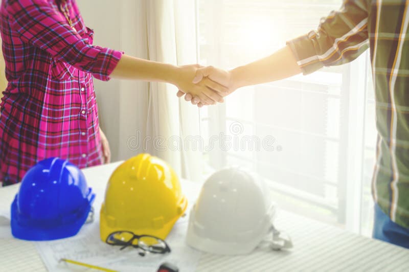 Asian Construction Engineer Joining Hands with Architect after F Stock ...
