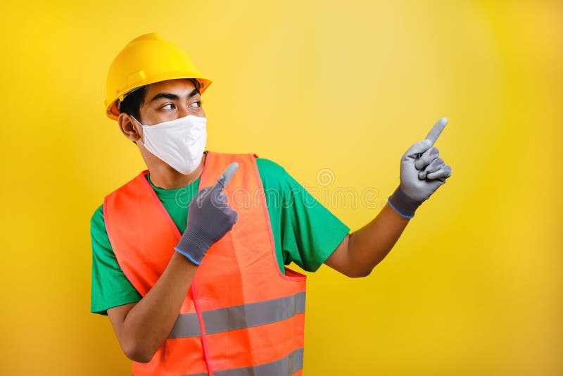 Asian Construction Worker Wearing Protective Mask Pointing Isomething ...