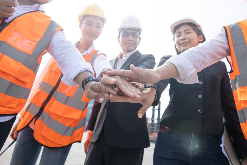 Asian Container Workers Join Hand for Collaboration Stock Image - Image ...