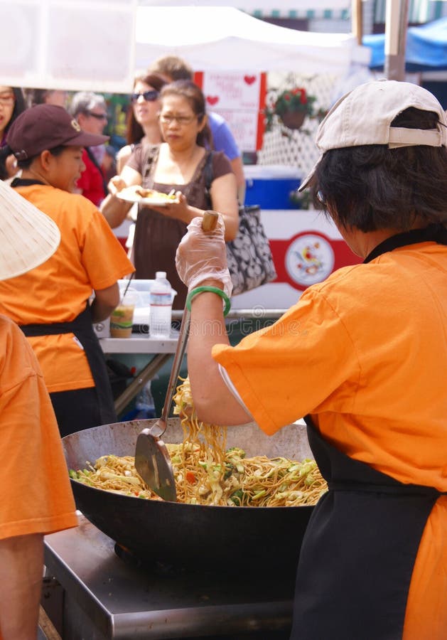 Asian Cooks Serving Food at Concessions. Editorial Stock Image - Image ...