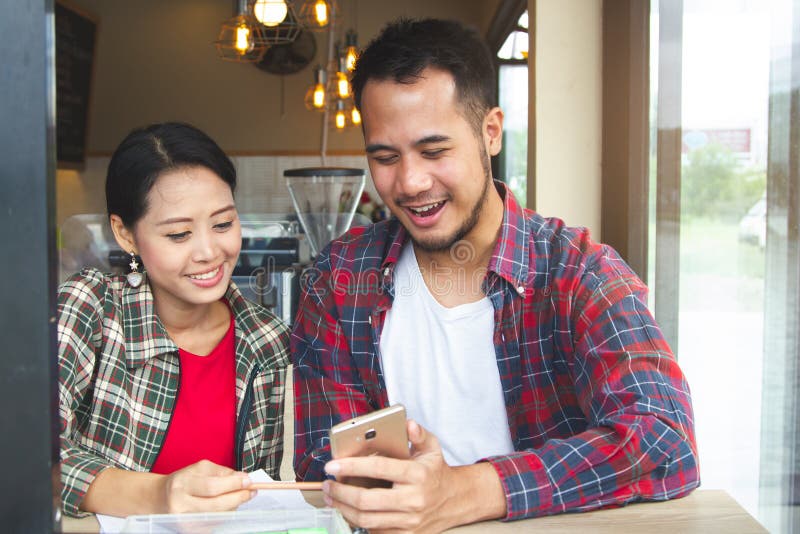 Asian Couple on First Date Talking in the Cafe Stock Image - Image of ...