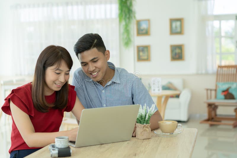 Couple Using Computer Planning To Travel Stock Image - Image of ...